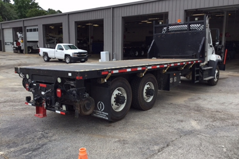 Heavy-Duty Hi-Rail Flatbed Truck Rental - Custom Truck One Source